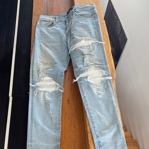 AMIRI | Jeans | Amiri Rip And Repaired Light Blue Denim White Leather ...